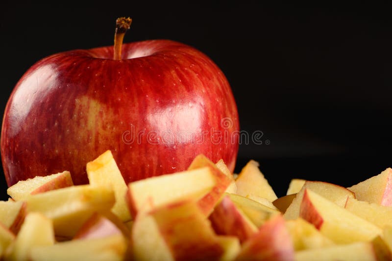Whole Red Apple with Small Pieces Stock Image - Image of focus, fruit ...
