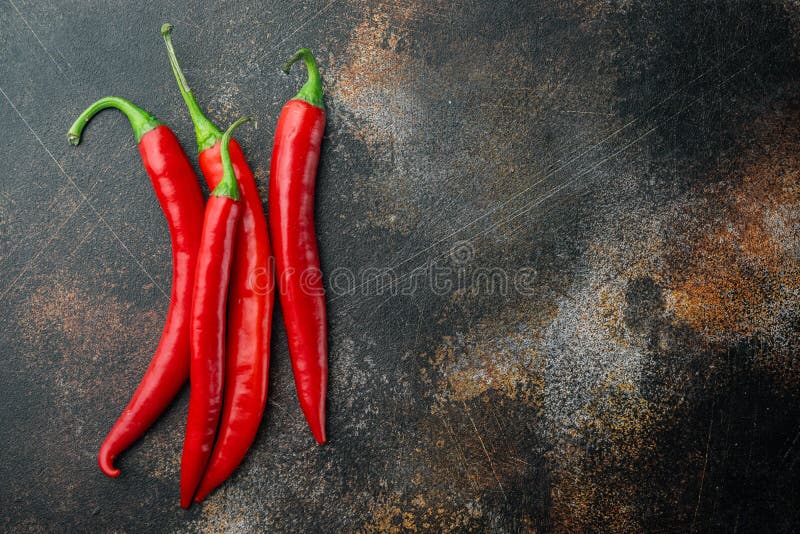 Whole Red Chili Peppers, on Old Dark Rustic Background, Top View or ...