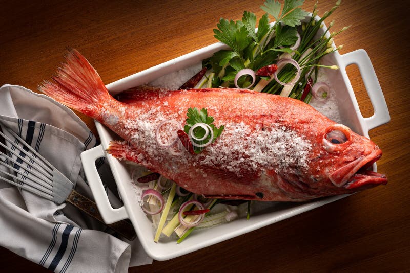 Whole Red Fish with Sea Salt and Herbs Stock Photo - Image of fresh ...