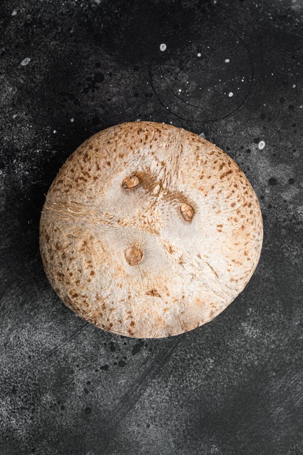 Whole Ripe Fresh Coconut, on Black Dark Stone Table Background, Top ...