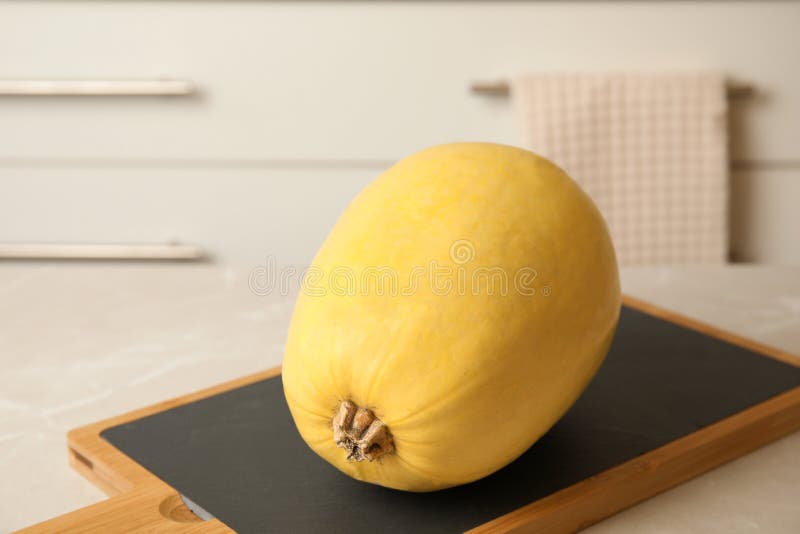 Whole Ripe Spaghetti Squash on Table Stock Photo - Image of squash ...