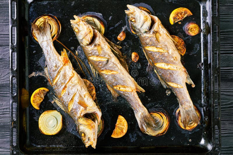 Whole Roasted Sea Bass Top View, Copy Space Stock Photo - Image of herb ...