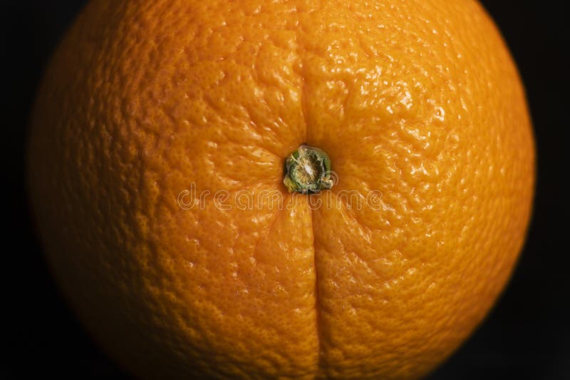 A Single Orange Slice on a Black Background. Stock Photo - Image of ...