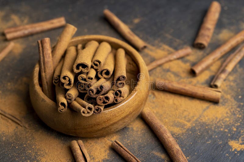 Whole Spice Cinnamon and Powdered Cinnamon on the Table Stock ...