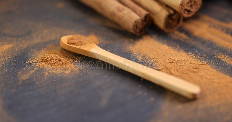 Whole Spice Cinnamon and Powdered Cinnamon on the Table Stock Footage ...