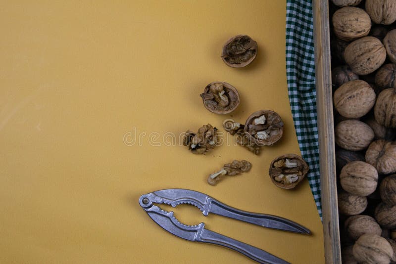 Whole Walnuts in Shells in a Box, Walnuts Kernels. Next To the Box is a ...