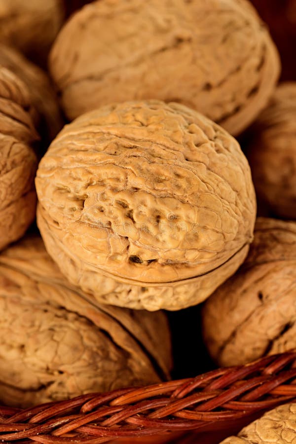 Whole Walnuts and Walnut Kernel in a Wicker Basket Stock Image - Image ...