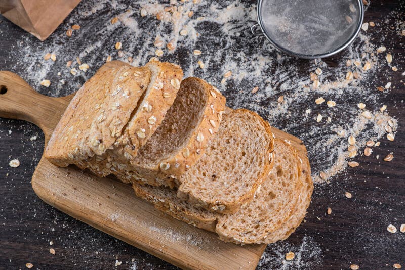 Whole wheat bread with row stock photo. Image of food - 123658274