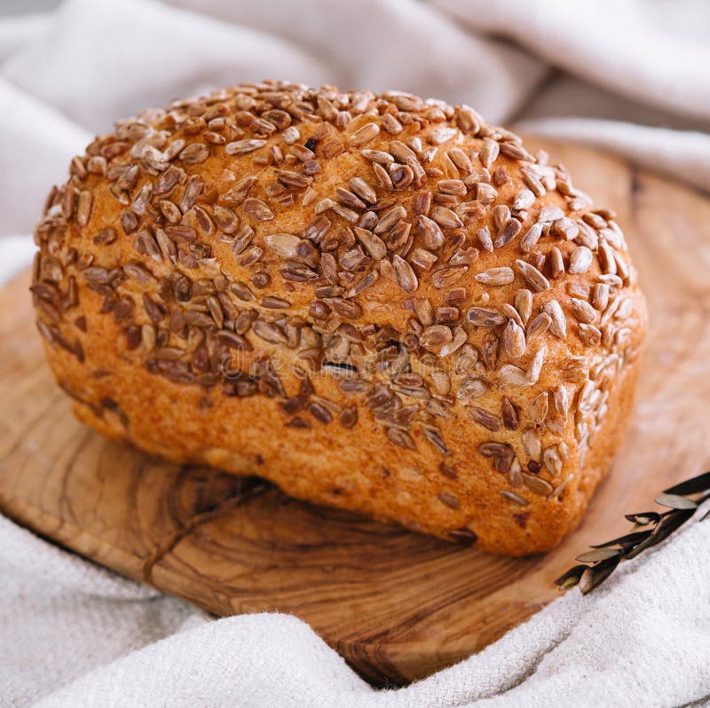 Whole Wheat Bread with Seeds on Wood Stock Photo - Image of natural ...