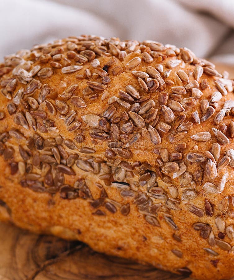 Whole Wheat Bread with Seeds on Wood Stock Image - Image of grains ...