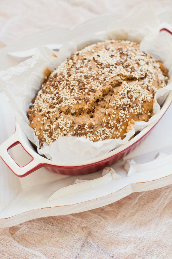Whole Wheat Bread with Sesame Seeds and Flax Seeds in Baking Form Stock ...
