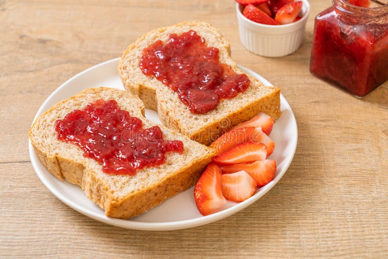 Whole Wheat Bread with Strawberry Jam and Fresh Strawberry Stock Photo ...
