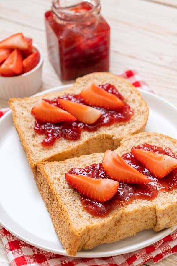 Whole Wheat Bread with Strawberry Jam and Fresh Strawberry Stock Photo ...