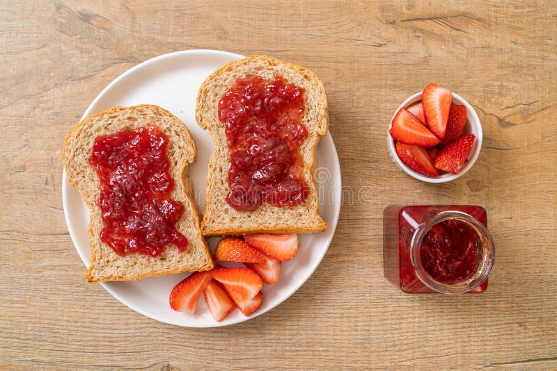 Whole Wheat Bread with Strawberry Jam and Fresh Strawberry Stock Photo ...