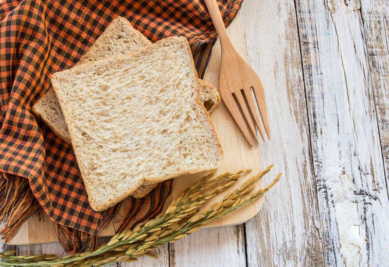Whole Wheat Bread on White Wooden Table Stock Photo - Image of bread ...