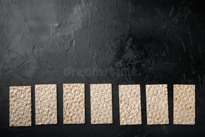 Wholegrain Rye Crispbread Cracker, on Black Dark Stone Table Background ...