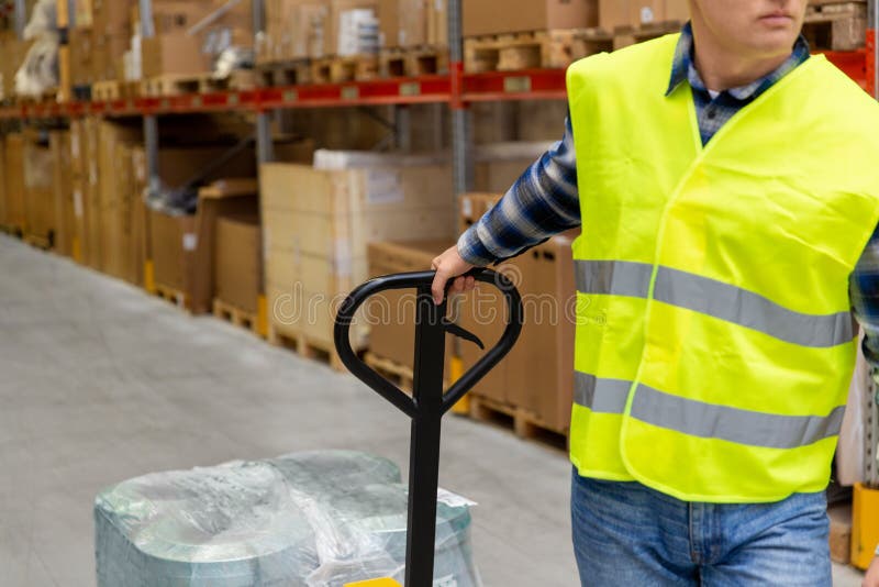 Man with Loader Working at Warehouse Stock Photo - Image of delivering ...