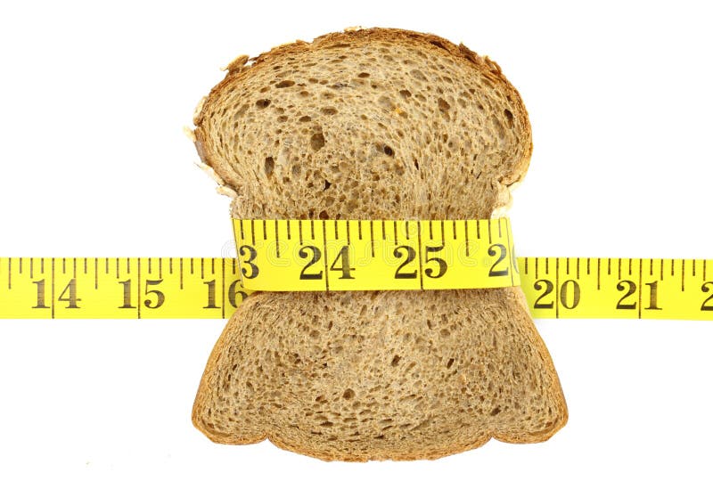 Wholesome Slice of Bread with Measuring Tape Stock Photo - Image of ...