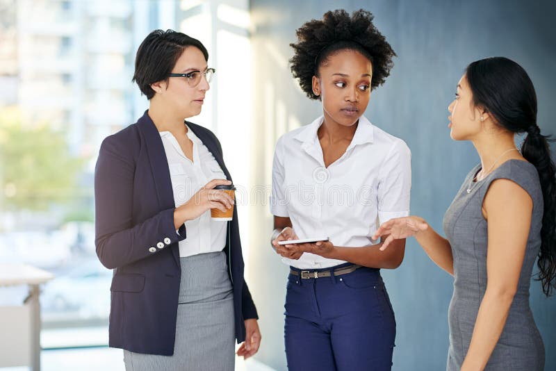 Whos the Boss. Three Businesswomen Talking in the Office. Stock Photo ...