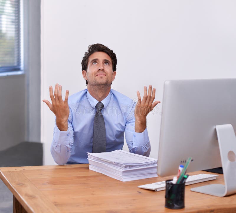 Why always Me. a Frustrated-looking Businessman at His Desk. Stock ...