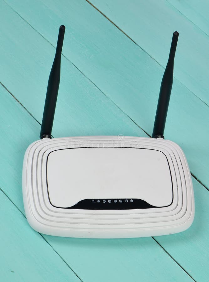Wi-fi Router with Antennas on a Blue Wooden Table. Stock Image - Image ...