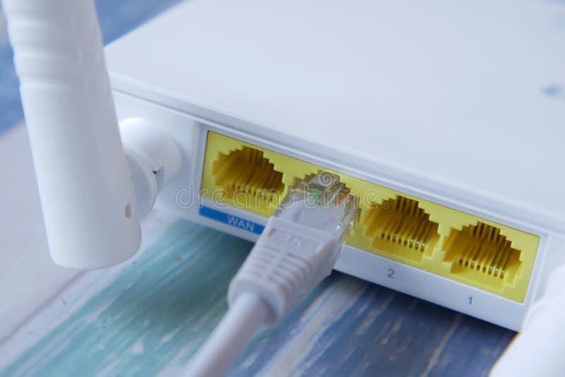 Wi-Fi Router with Cables on Table Stock Photo - Image of digital, port ...