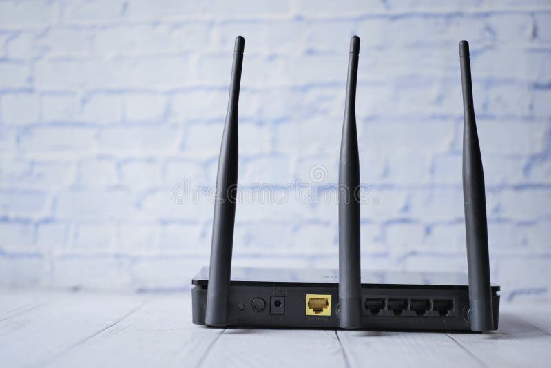 Wi-Fi Router with Cables on Table Stock Image - Image of center ...