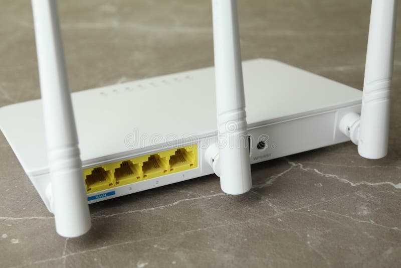 Wi - Fi Router on Gray Wooden Table, Close Stock Image - Image of ...