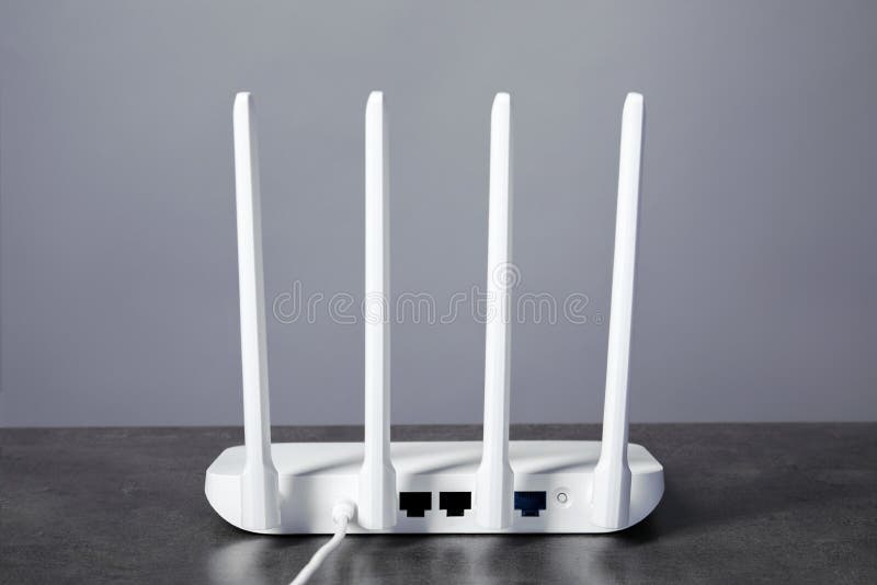 Wi-Fi Router on Grey Textured Table, Back View Stock Photo - Image of ...