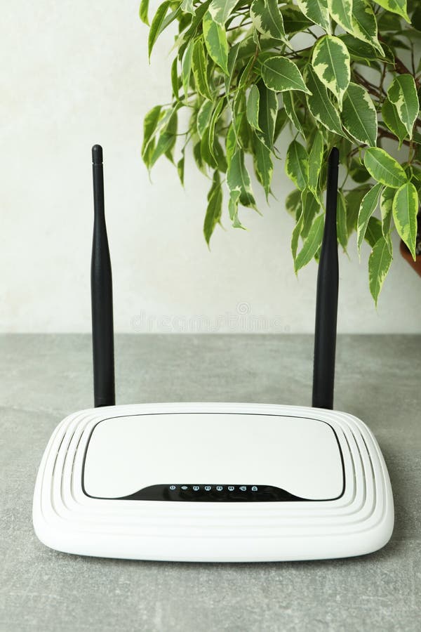 Wi - Fi Router on Gray Wooden Table, Close Stock Image - Image of ...
