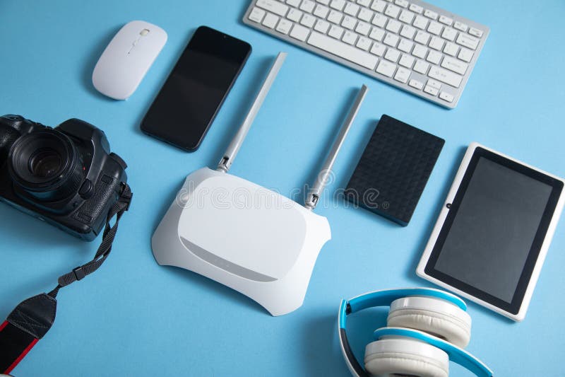 Wi Fi Router with a Tablet, Phone, Computer Keyboard and Other Objects ...