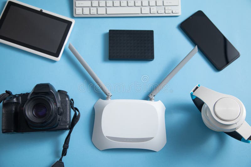 Wi Fi Router with a Tablet, Phone, Computer Keyboard and Other Objects ...