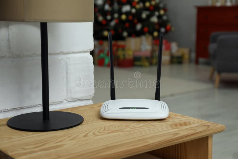 Wi-Fi Router on Wooden Table in Room Stock Image - Image of port ...