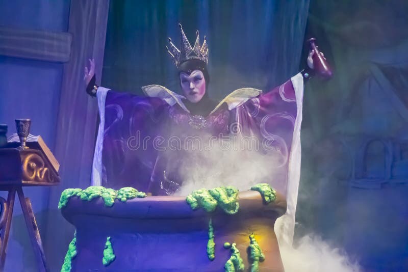 Wicked Witch Casting Spell into Cauldron Editorial Stock Photo - Image ...