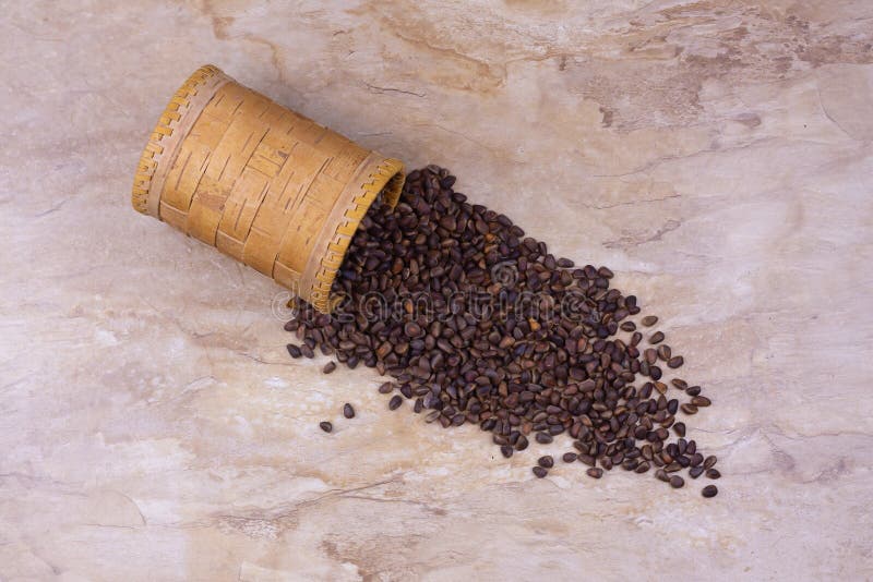 Wicker Basket of Birch Bark with Pine Nuts. Healthy Eating Concept ...