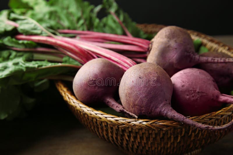 Wicker Basket with Bunch of Fresh Beets on Table, Stock Photo - Image ...