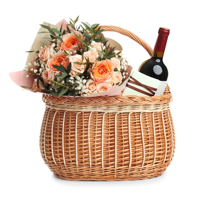 Wicker Basket with Different Gifts on White Background Stock Photo ...