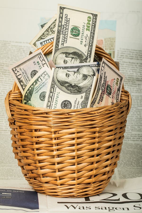 A Wicker Basket Full of Money Over Table Stock Image - Image of banking ...