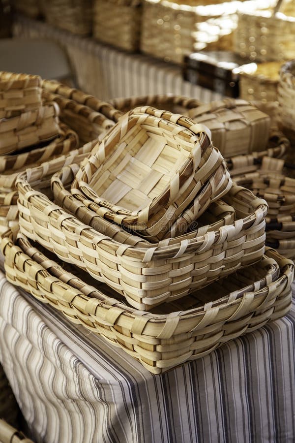 Wicker baskets in a market stock photo. Image of container - 252249412