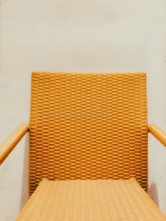 A Wicker Chair with a Yellow Seat Stock Image - Image of chair, yellow ...
