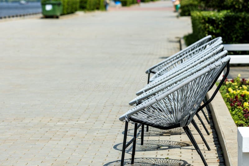 Wicker Chairs Outdoors on the Footpath. Chairs for Relaxing on the ...