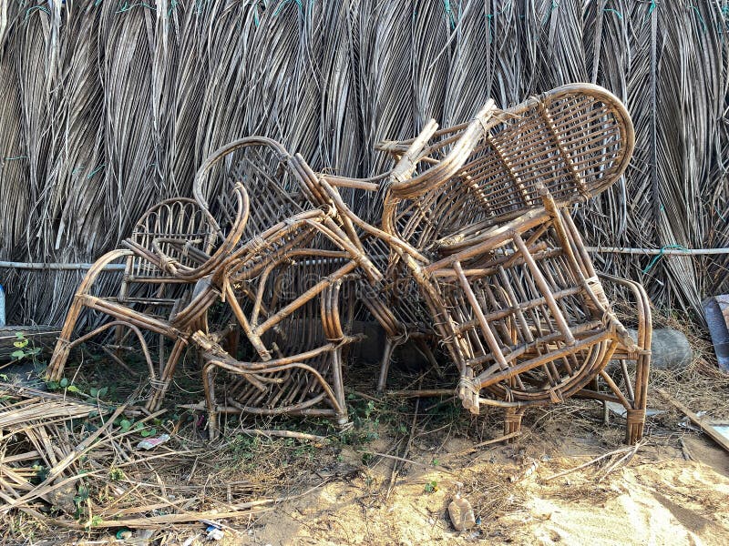 Wicker Chairs Piled beside the Straw Wall Stock Image - Image of ...