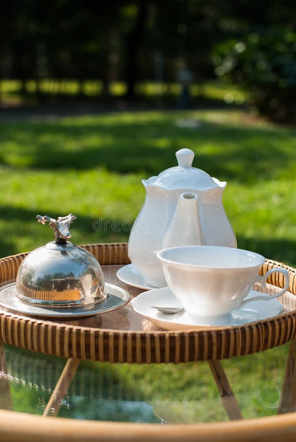 Wicker Chairs and Table with Tea Set Stock Photo - Image of drink ...