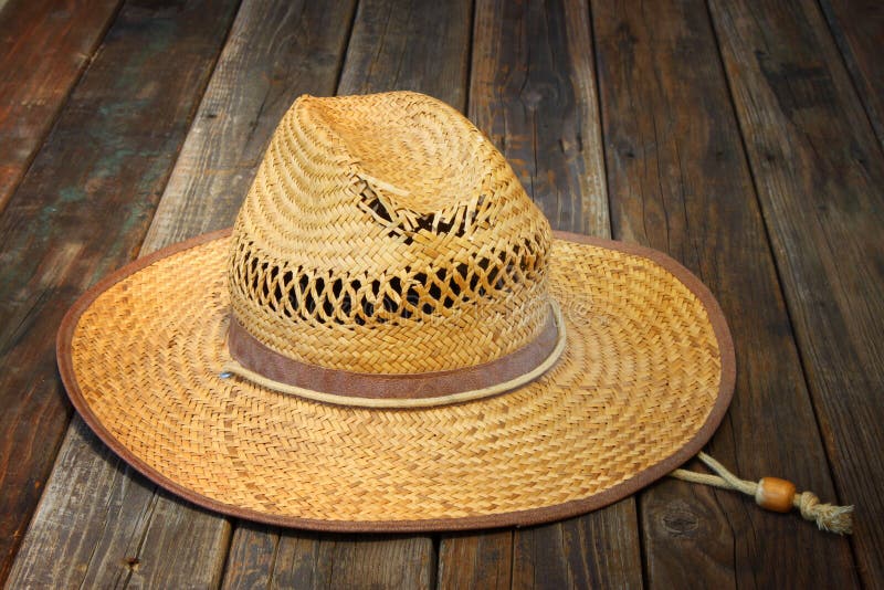 Wicker hat on wooden table stock image. Image of rural - 35738751