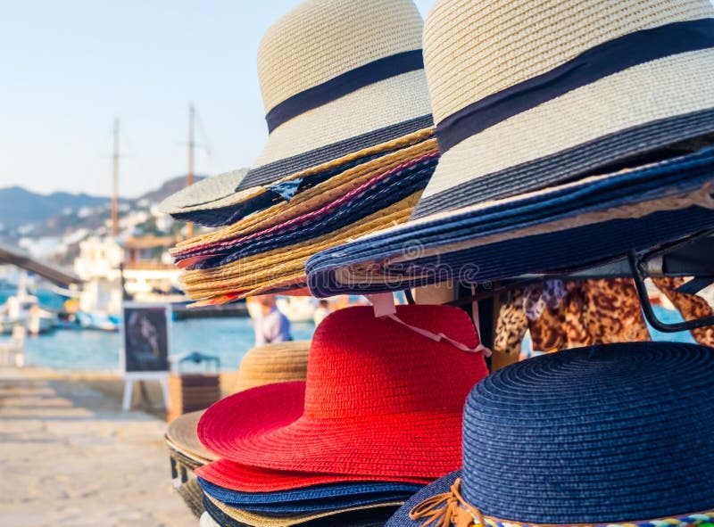Wicker hats on the stand stock photo. Image of design - 124337218