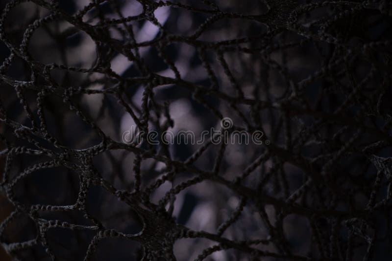 Wicker Mesh of Threads As a Background with a Soft Blurred Focus in the ...