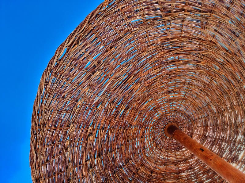 Wicker umbrella in Mamaia stock image. Image of dome - 256274087
