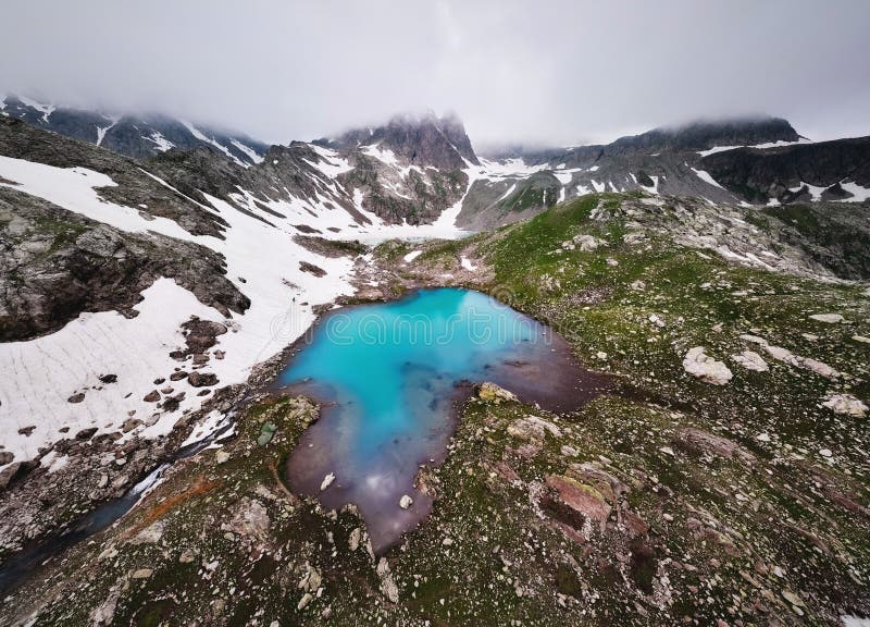Wide Angle Aerial View Mountain Lake at the Foot of a Big Mountain ...