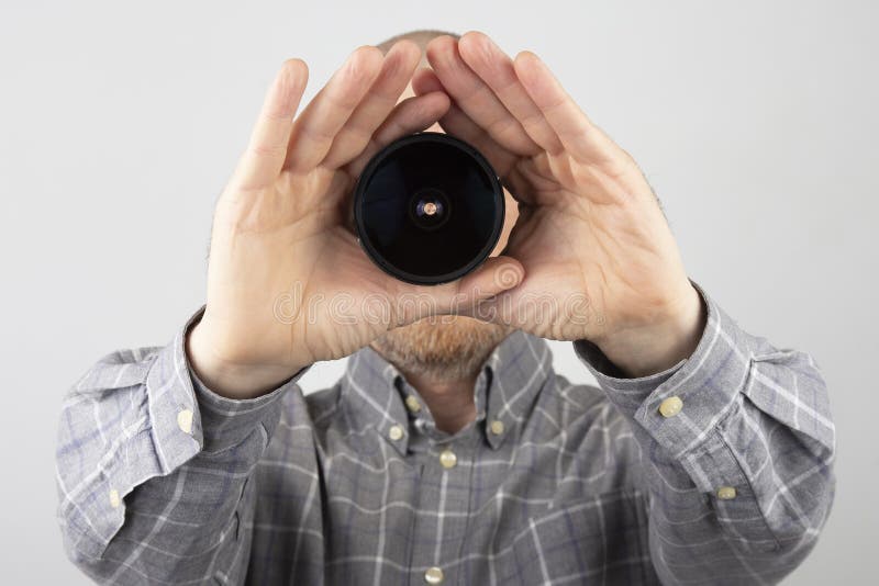 Wide Angle Camera Lens in Hand on White Background Stock Photo - Image ...