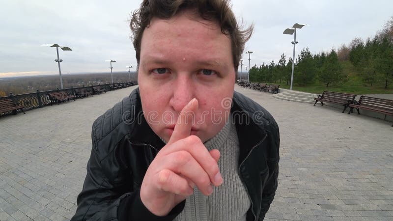 Wide Angle Lens: Young Fat Man Looking at Camera and Rejecting Offer by ...